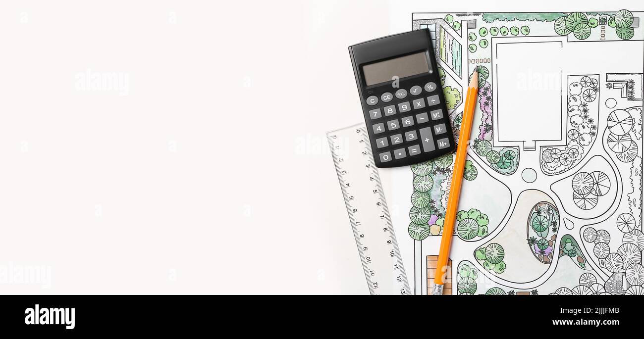 Landscape designer's plan, stationery and calculator on white ...