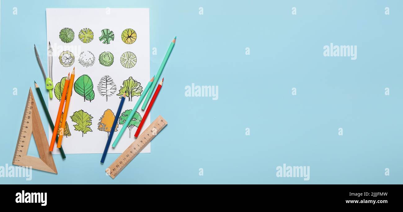 Paper sheet with sketches for landscape design and stationery on light ...