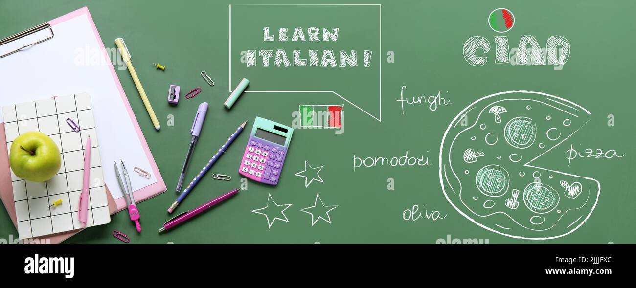 Stationery and text LEARN ITALIAN on school blackboard Stock Photo - Alamy