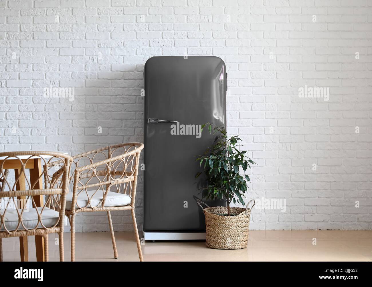 Stylish grey retro fridge in interior of dining room Stock Photo - Alamy