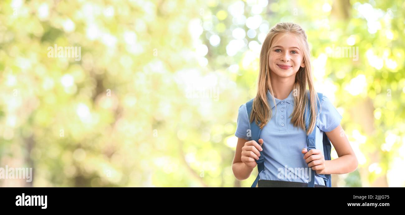 Teenage girl with backpack outdoors Stock Photo - Alamy