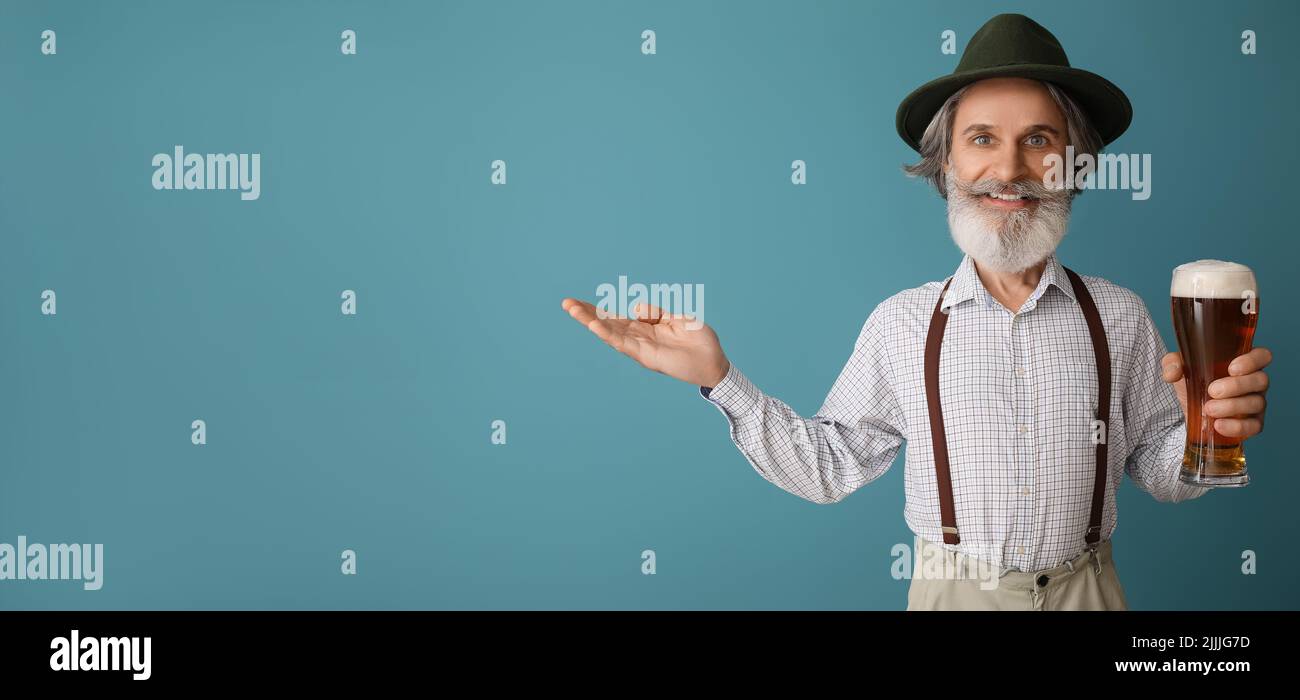 Funny man with big head, in traditional German clothes and with beer on ...