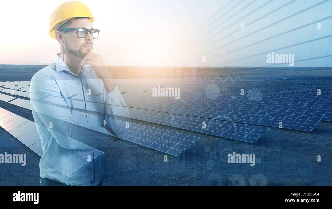 Double exposure of engineer and modern solar power plant in countryside ...