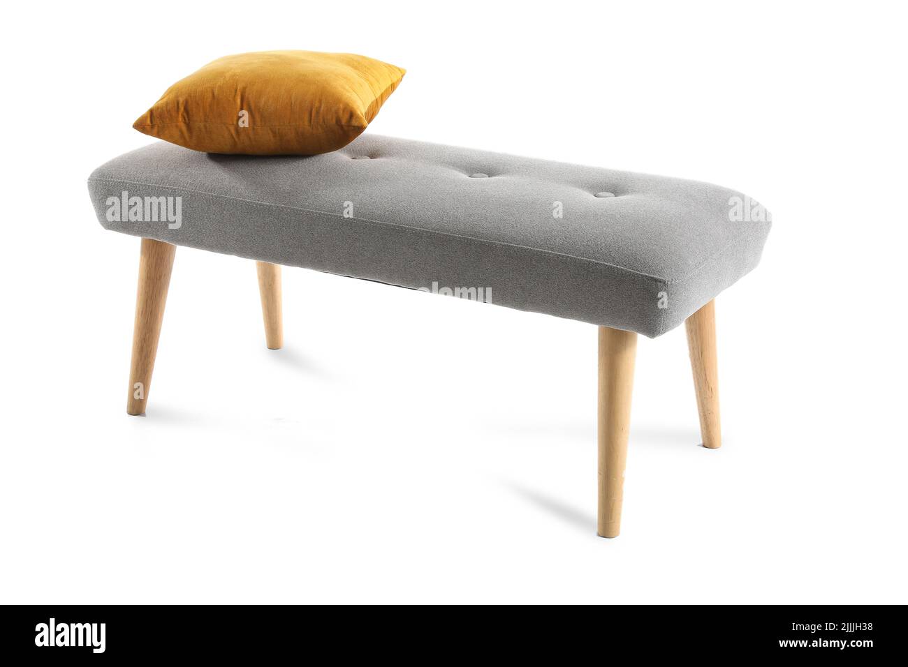Grey bench with pillow on white background Stock Photo - Alamy