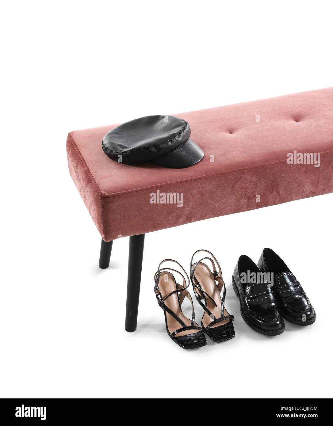 Pink bench with hat and shoes on white background Stock Photo - Alamy