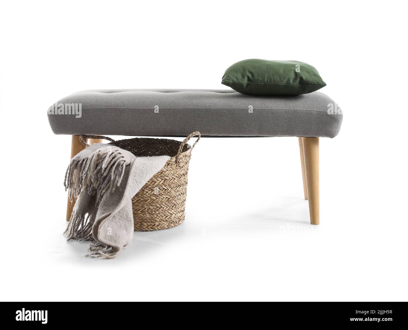 Grey bench with pillow, basket and plaid on white background Stock ...