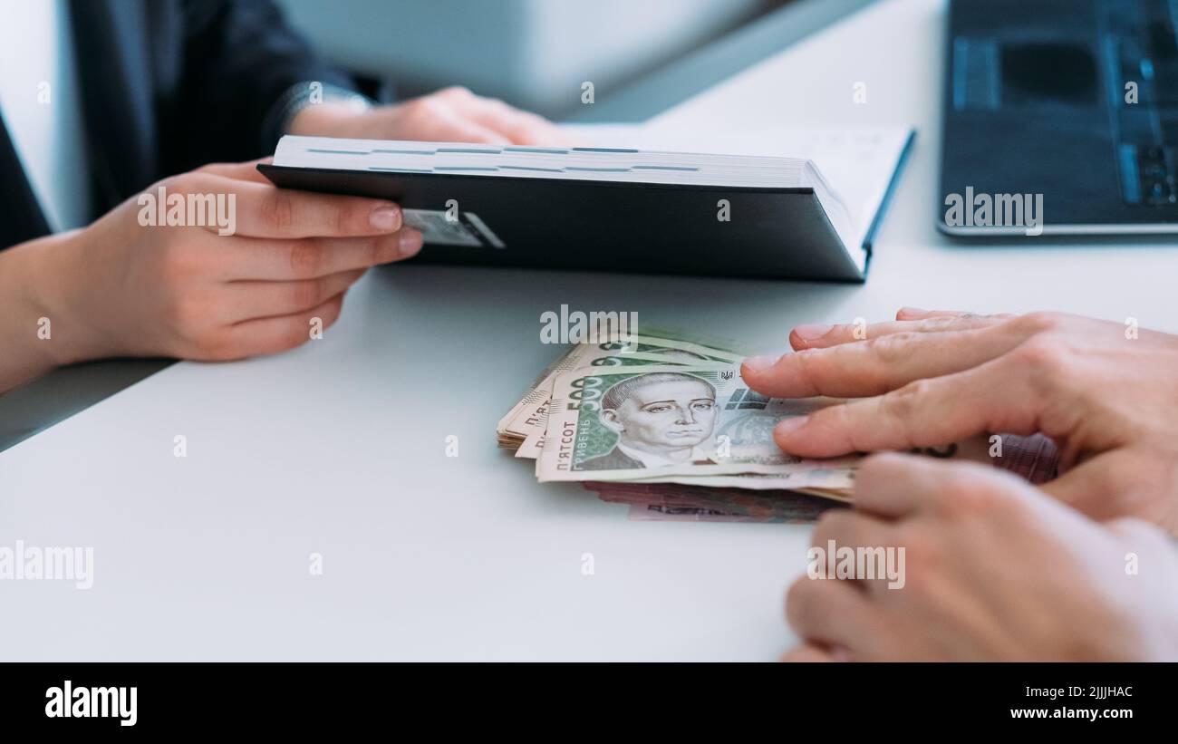 cash money bribe corruption compensation man woman Stock Photo - Alamy