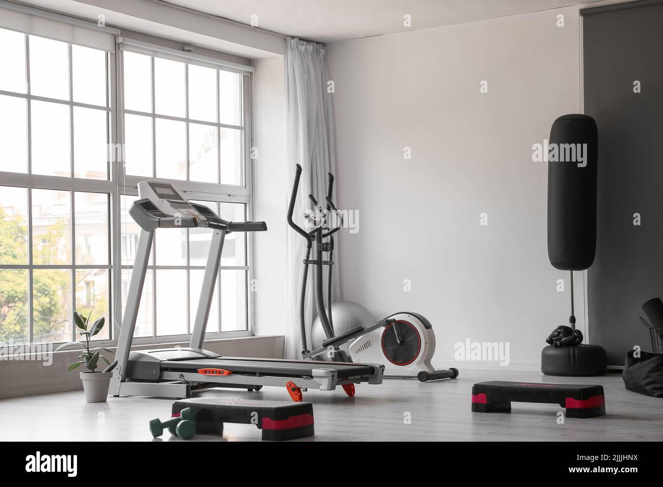 Interior of modern gym with treadmill and sport equipment Stock Photo ...