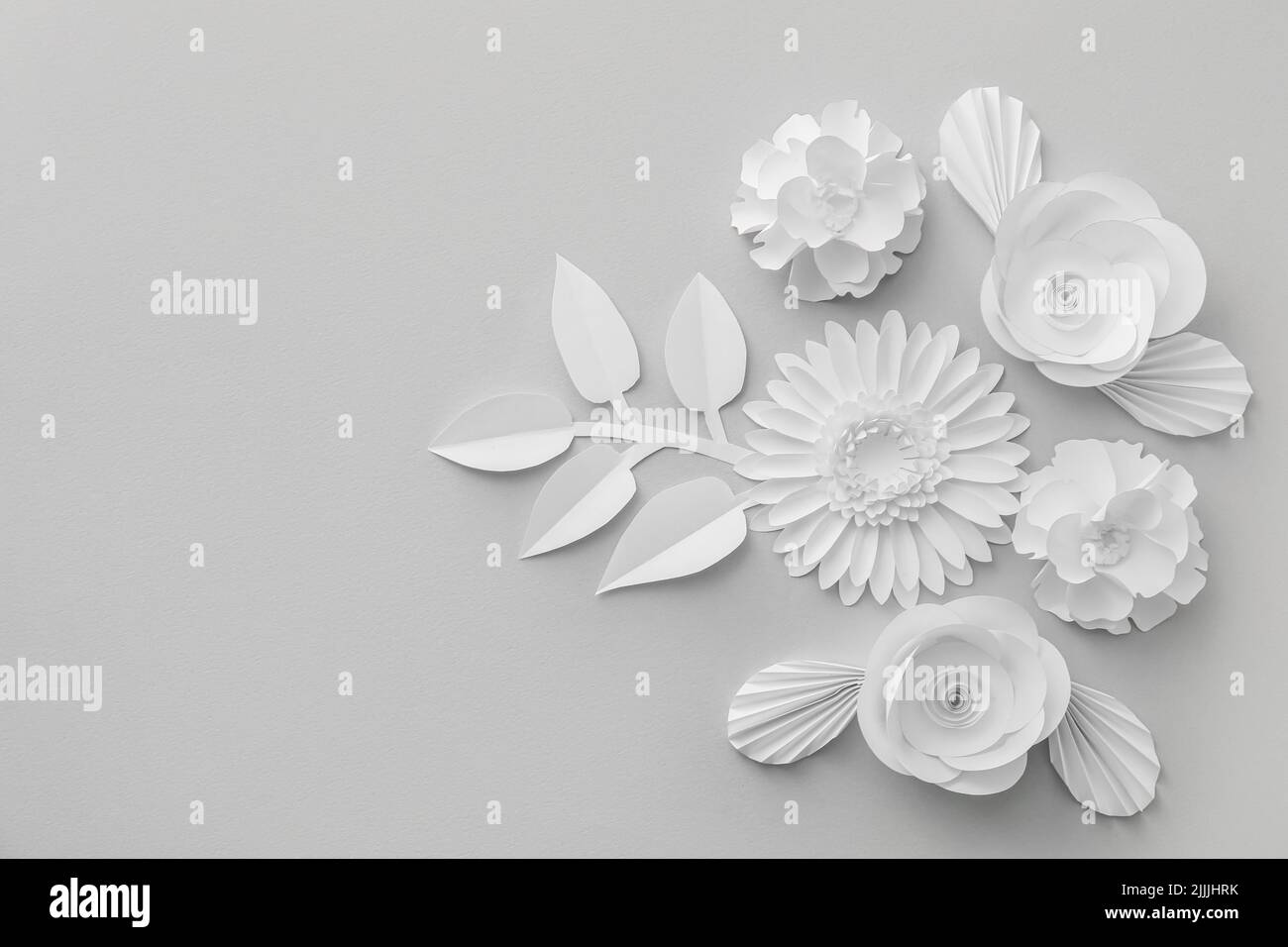 Composition with different paper flowers on grey background Stock Photo ...