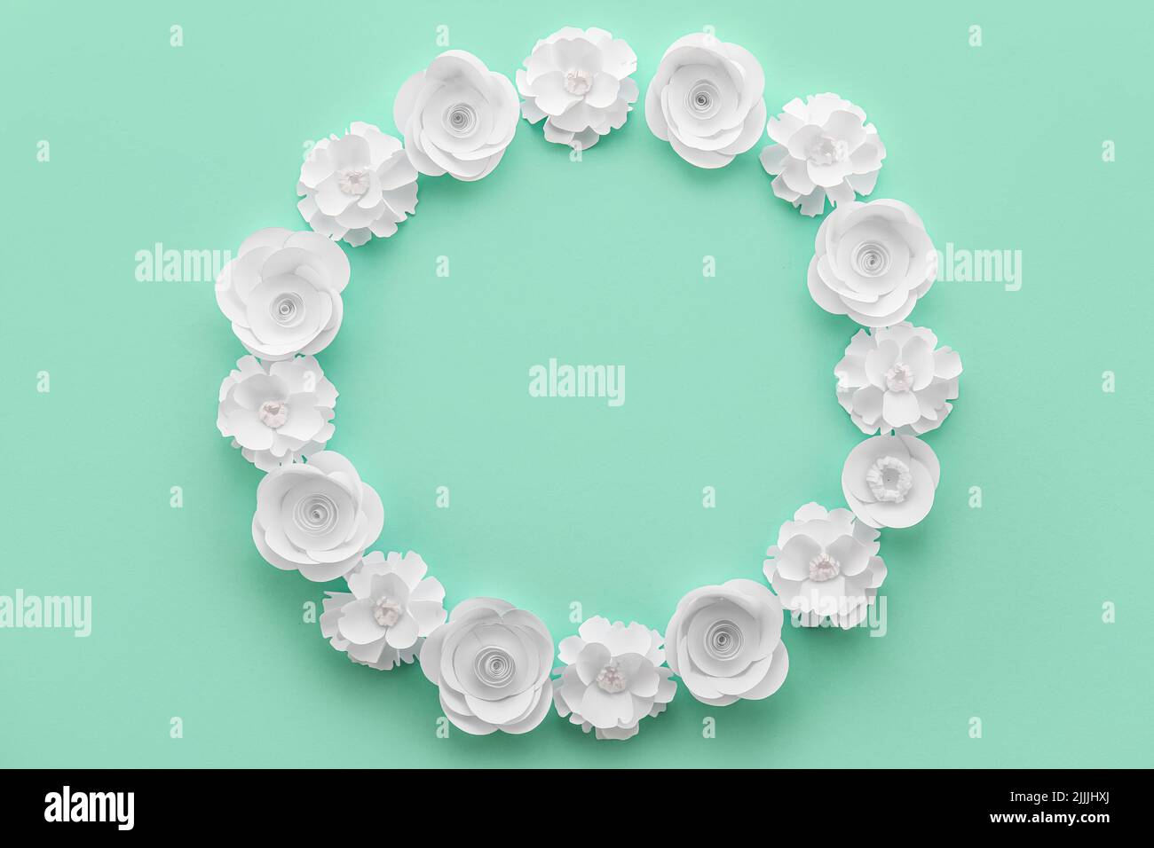 Frame made of beautiful origami flowers on color background Stock Photo ...