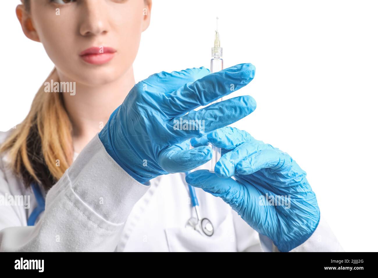 Doctor with syringe on white background, closeup Stock Photo - Alamy