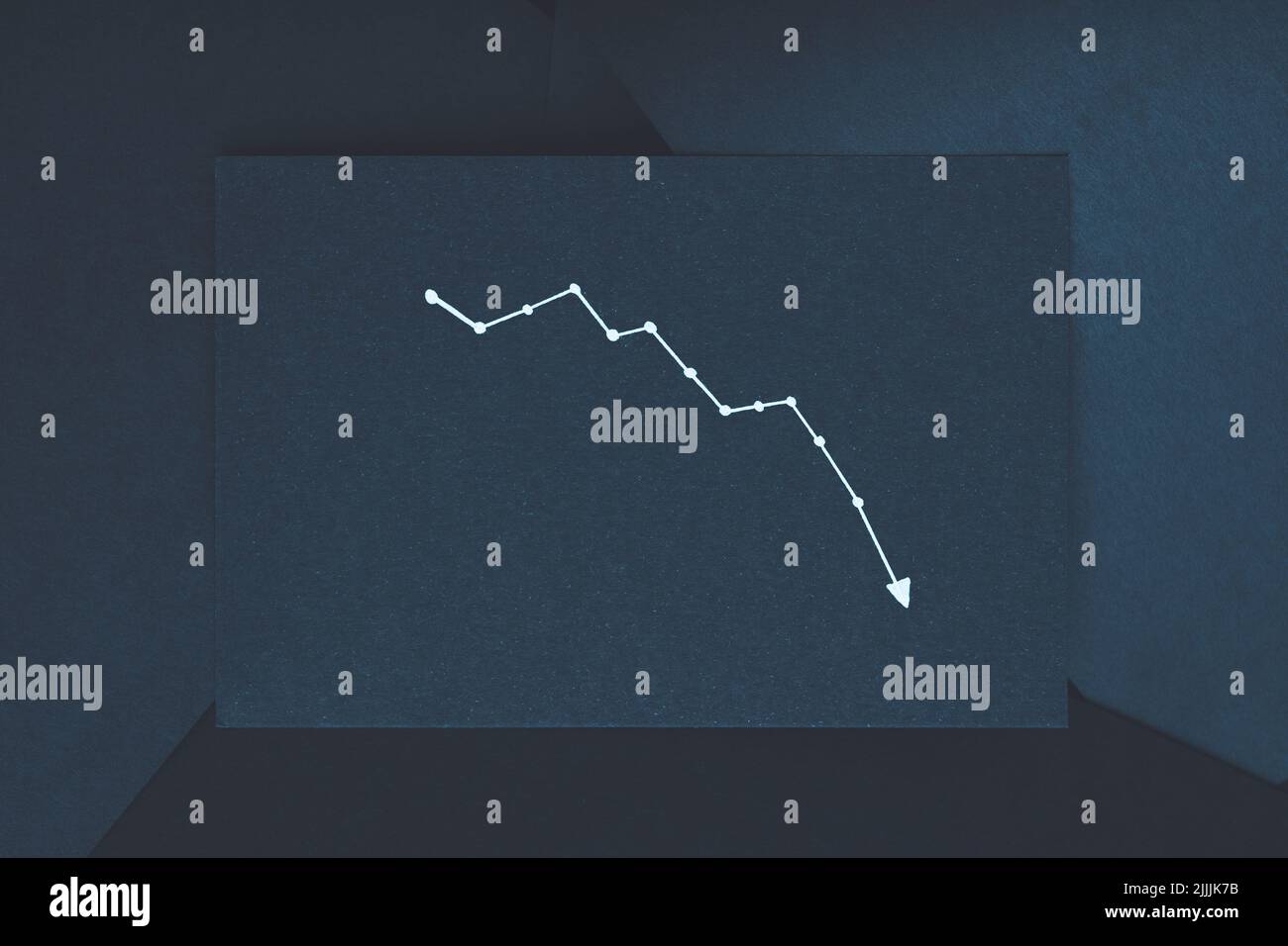 diagram down decline drop reduction blue backdrop Stock Photo - Alamy