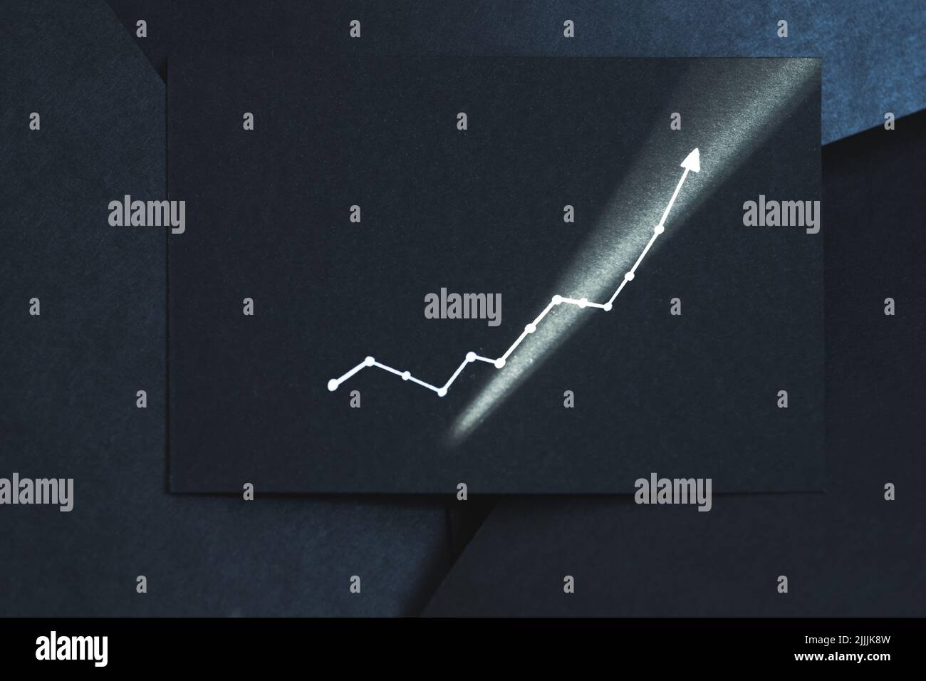 graph growth breakthrough success black paper Stock Photo - Alamy