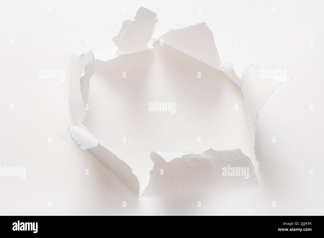 ripped torn white paper rough edge empty space Stock Photo - Alamy