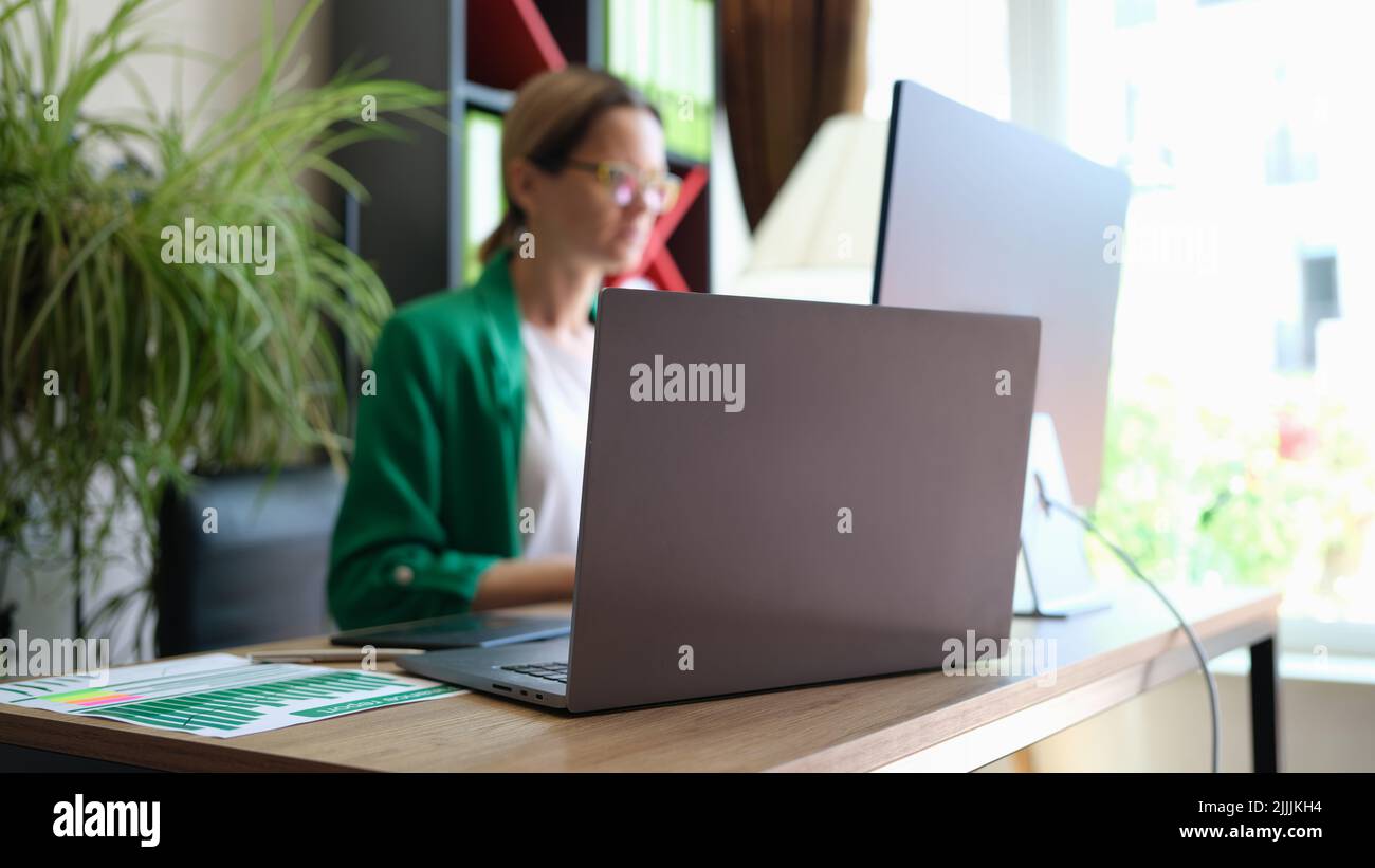 Office workplace interior with laptop and pc Stock Photo - Alamy