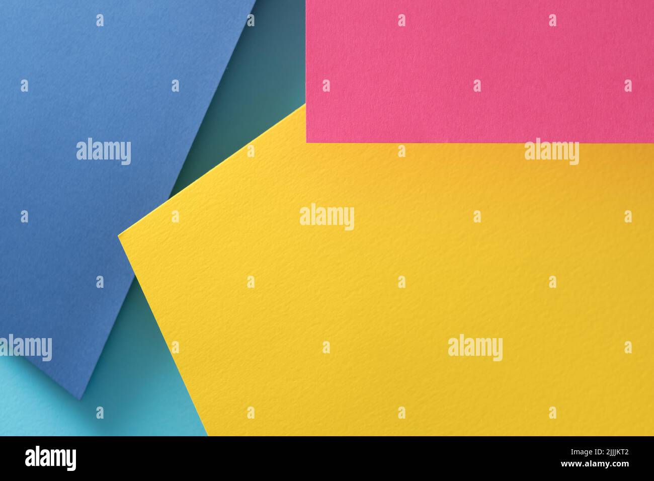 paper layers geometric background yellow blue pink Stock Photo - Alamy