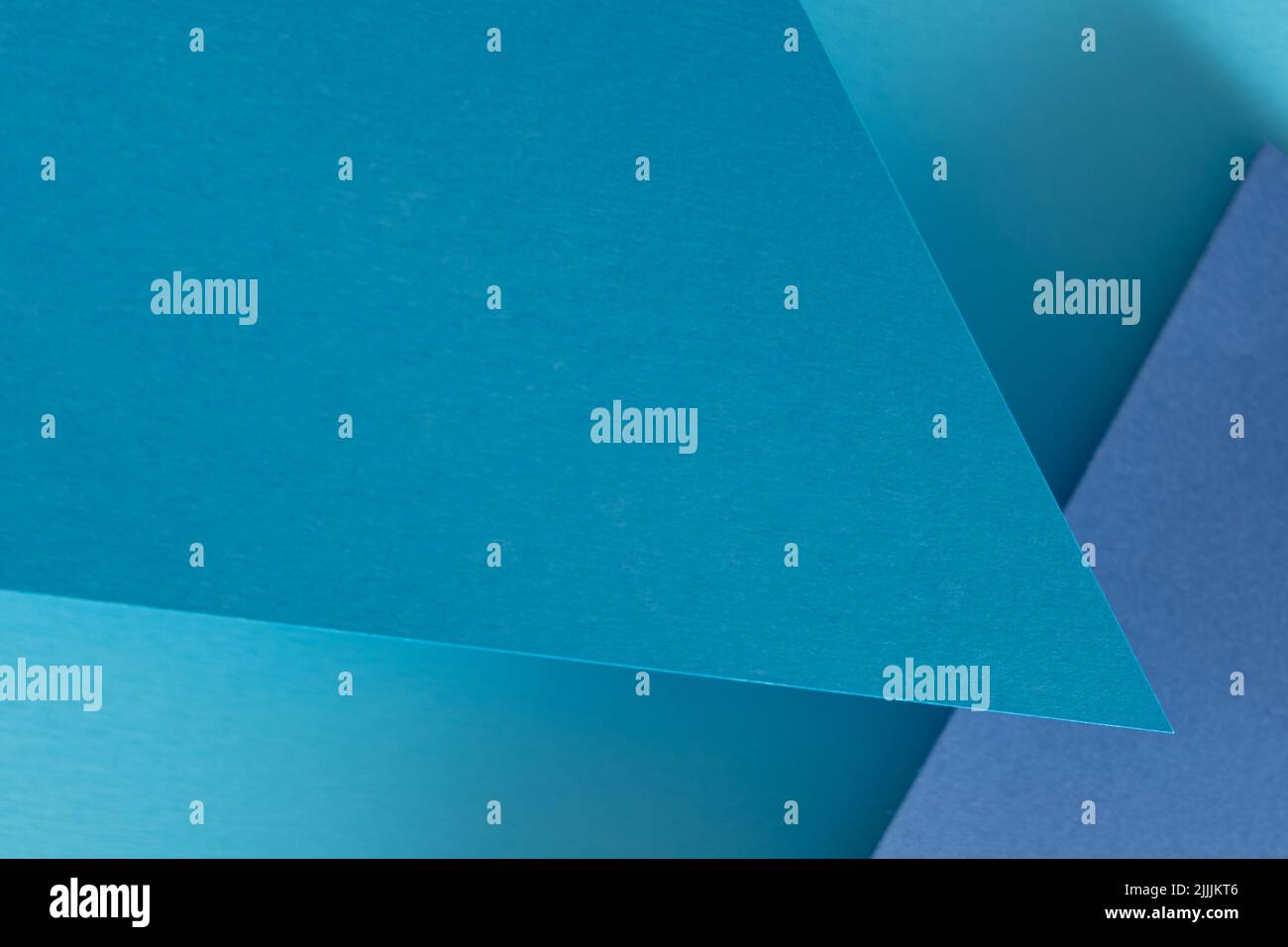 construction paper collage background blue layers Stock Photo - Alamy