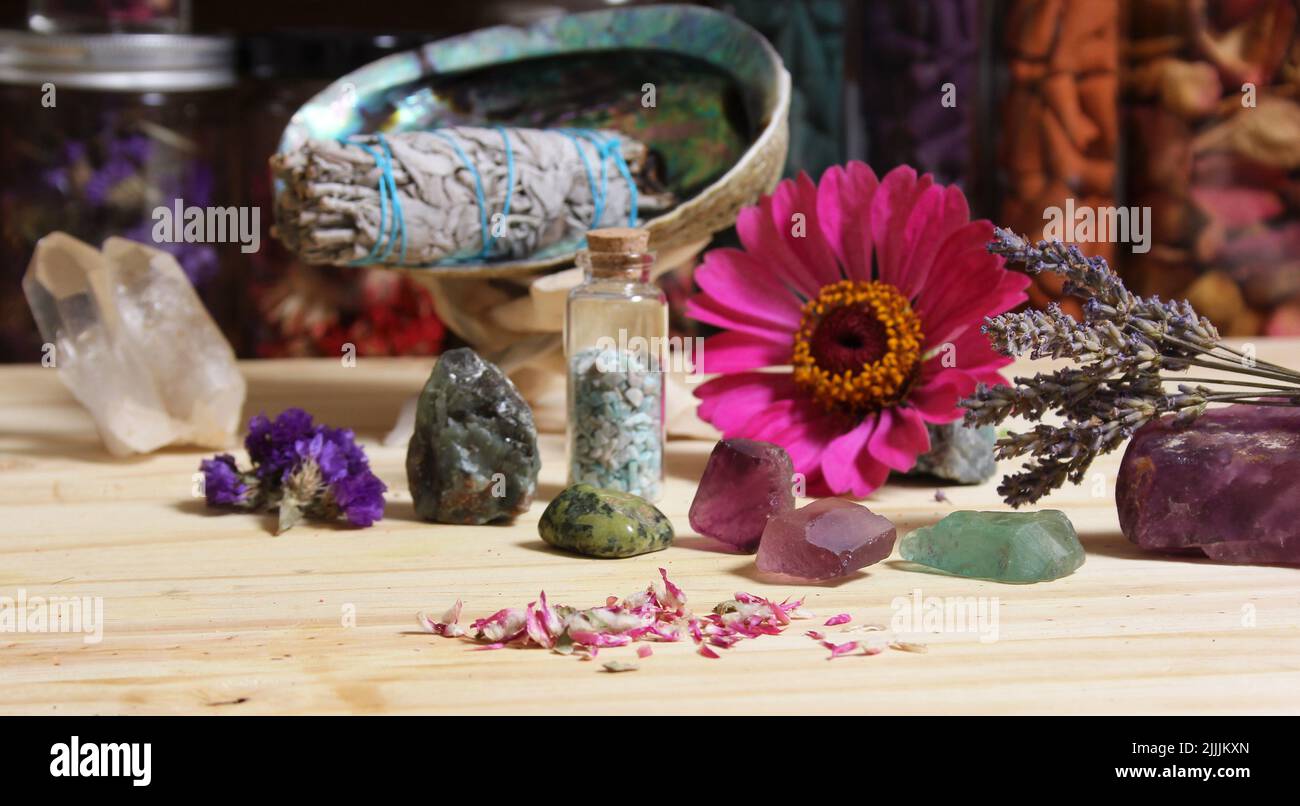 Dried Flowers and Crystal Chakra Stones on Meditation Altar Shallow DOF ...