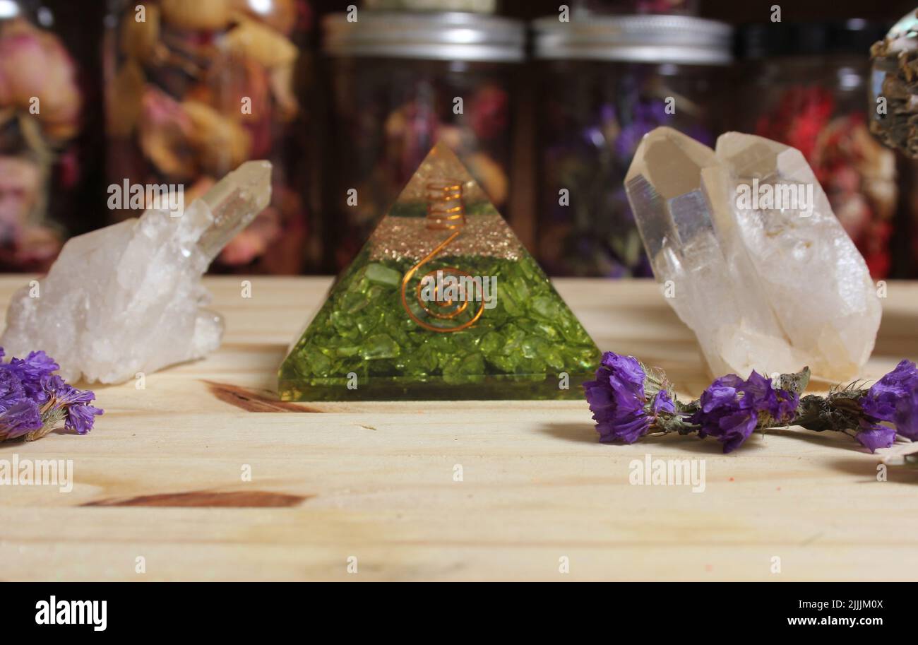 Quartz Crystals and Stone Pyramid With Flower. Relaxation and ...