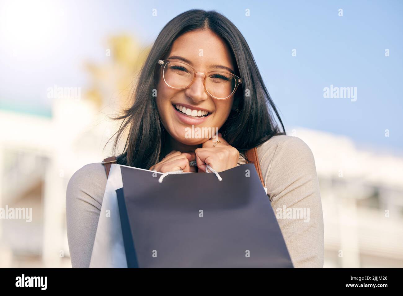 Retail therapy is a quick fix for any situation. Portrait of an ...