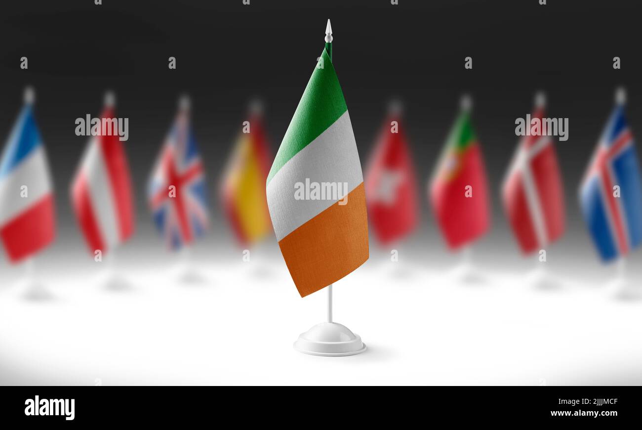 The national flag of the Ireland on the background of flags of other ...