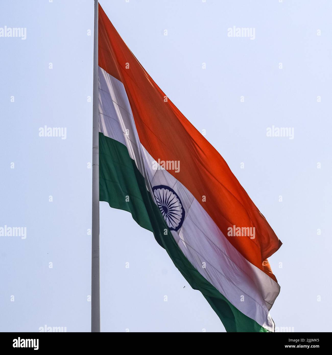 India flag flying high at Connaught Place with pride in blue sky, India ...