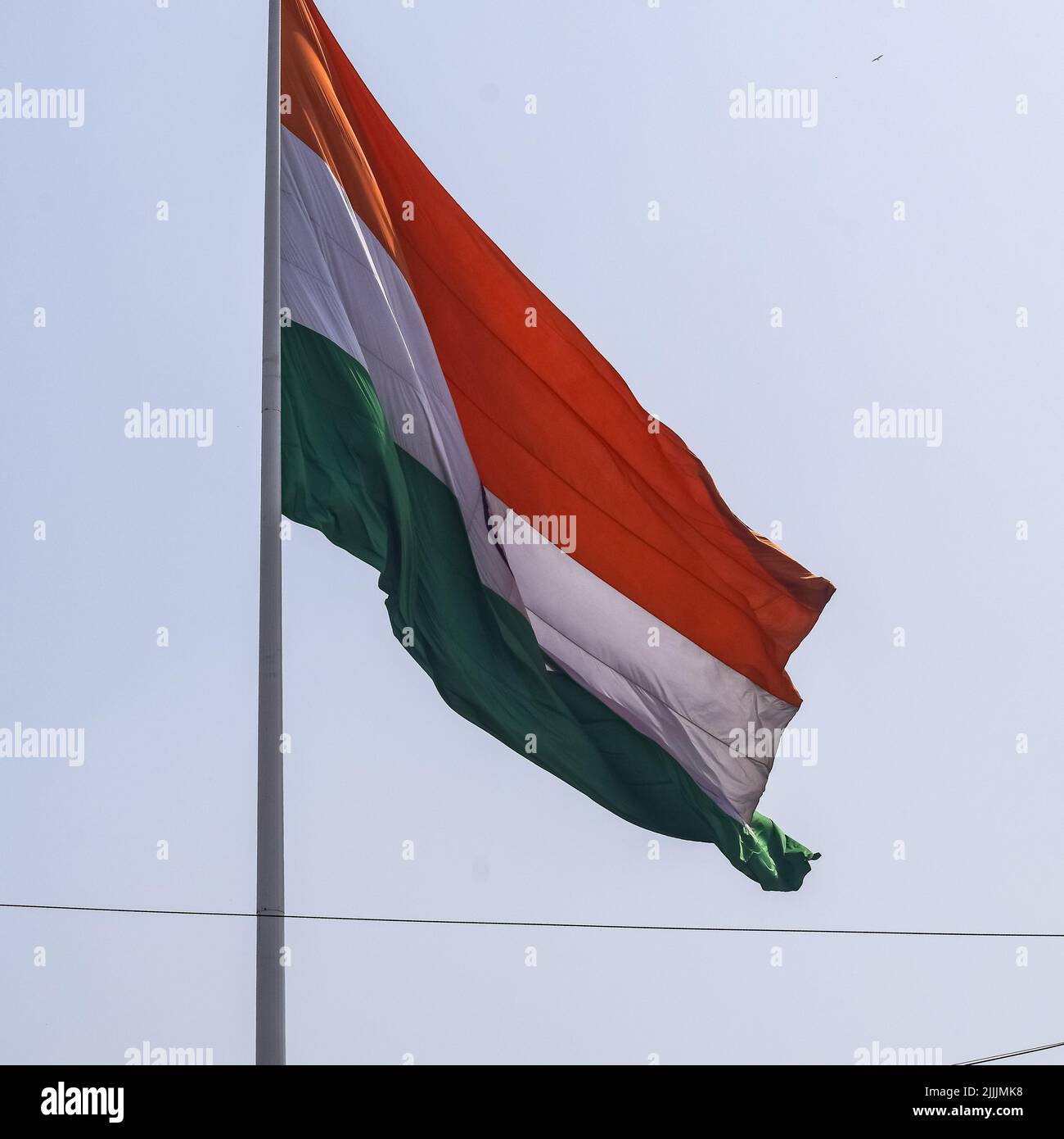 India flag flying high at Connaught Place with pride in blue sky, India ...