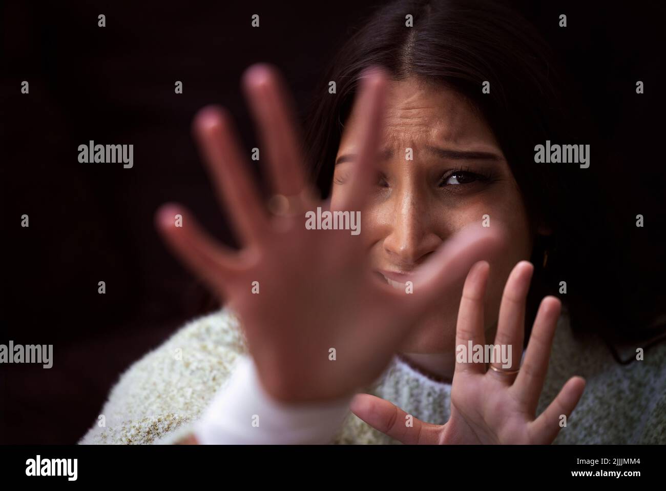 Be stronger than your fear and break the cycle. a young woman looking ...