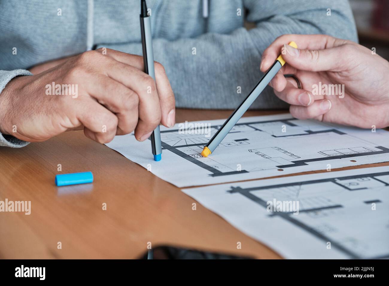 Male architects presenting model hi-res stock photography and images ...