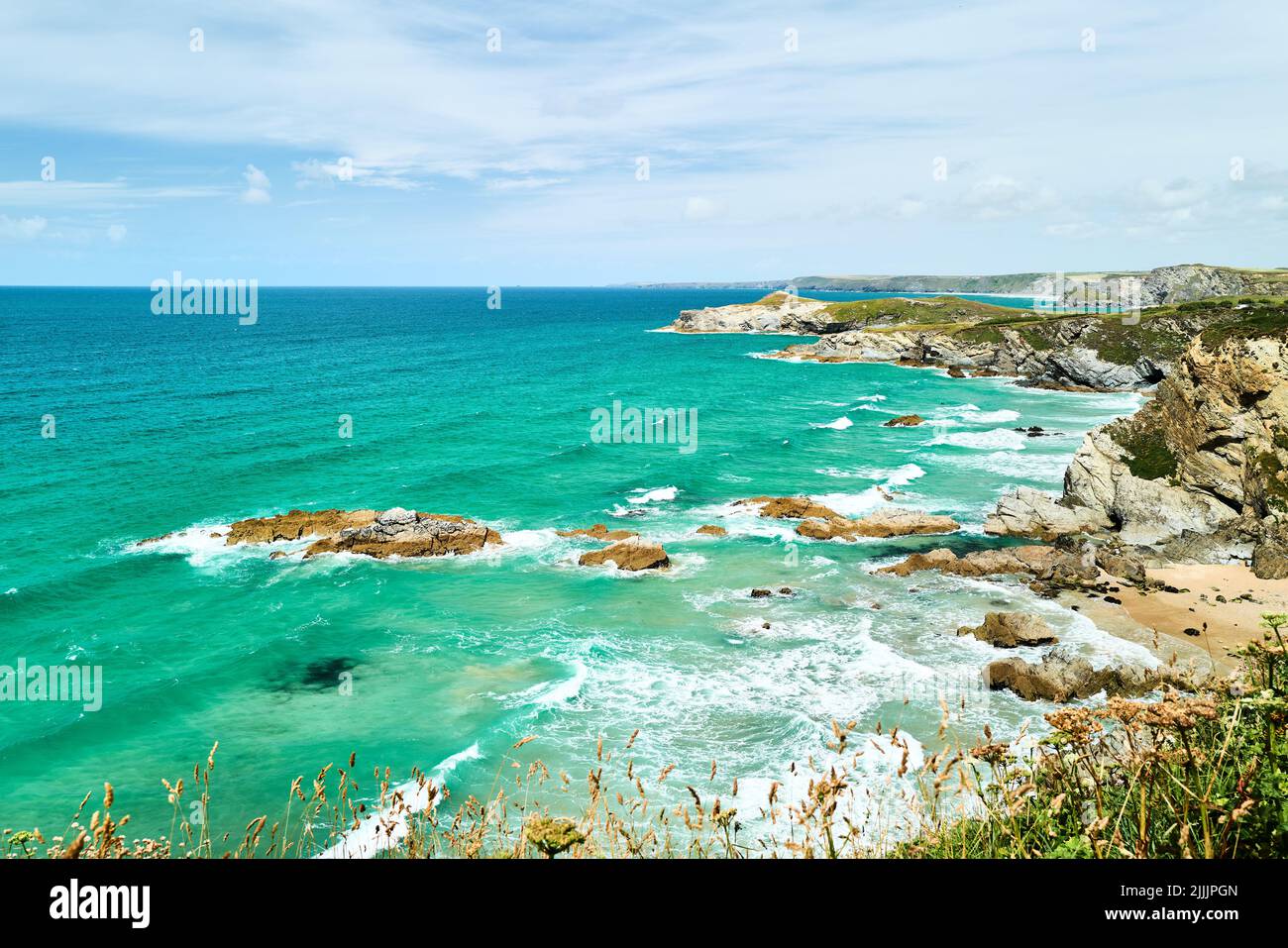 Surf waves from the Atlantic ocean break on the shore of the sandy ...