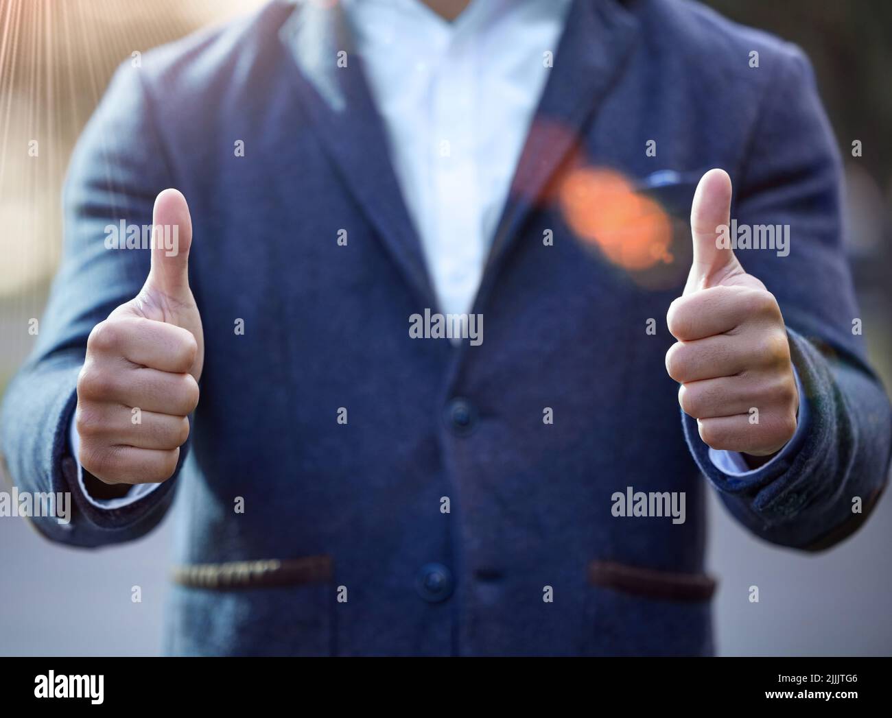 Guide yourself to a happier life. a businessman giving the thumbs up ...