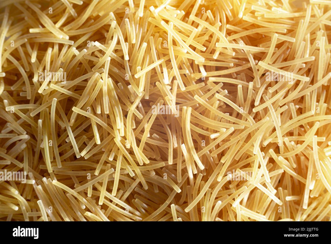 the pasta is thin. Dry thin pasta pasta very close. Macro Stock Photo ...