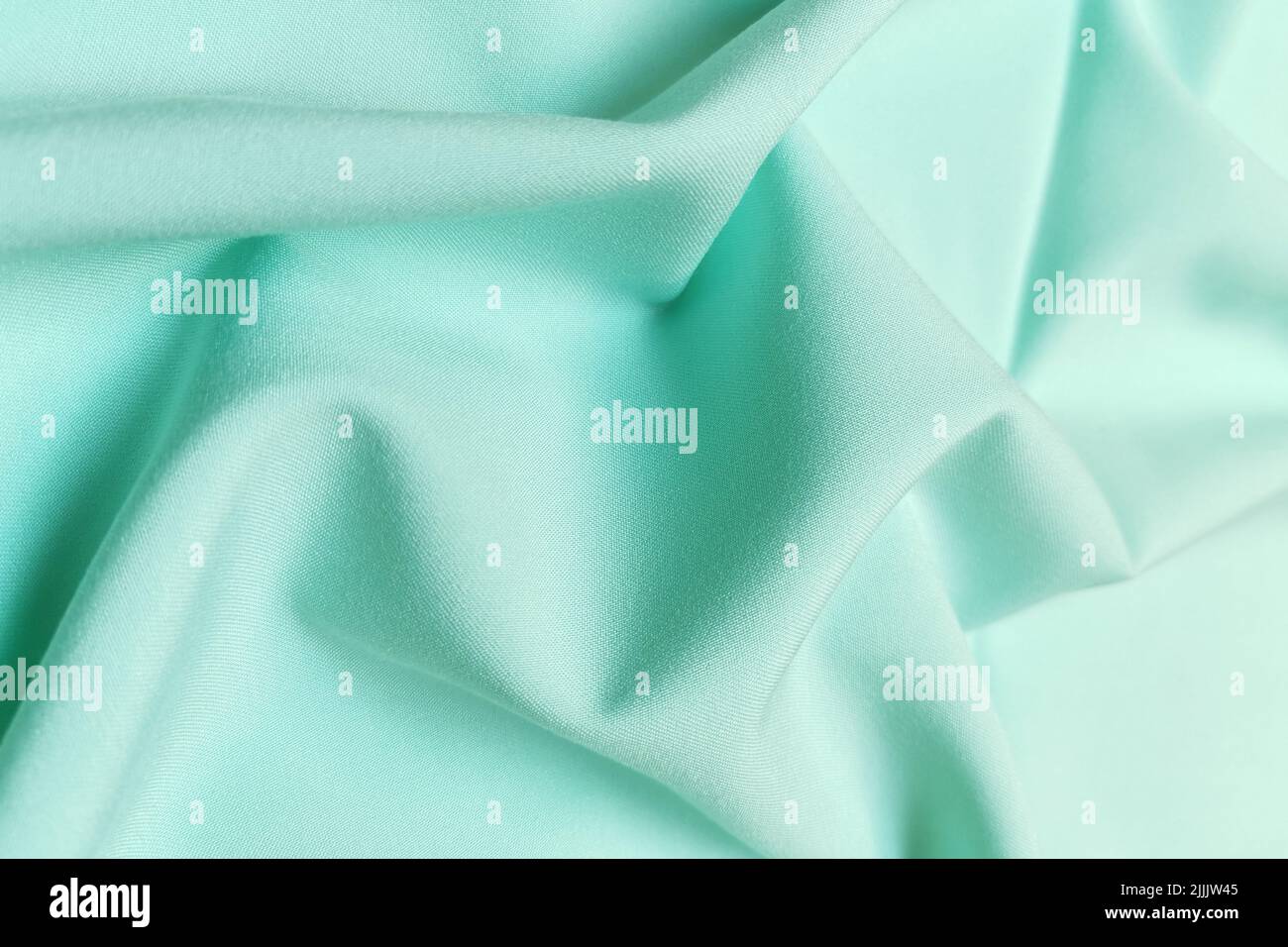 Green galliano fabric crumpled or wavy fabric texture background ...