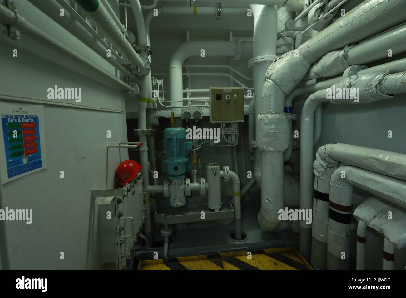 Pipework in ship's engine room Stock Photo - Alamy