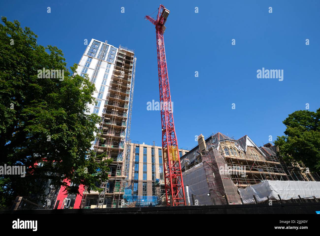 New apartment building housing being constructed in downtown next to ...