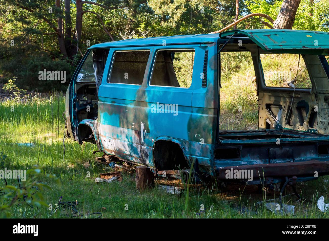 Old, damaged car. Abandoned car in the woods.Defective car. A car unfit ...