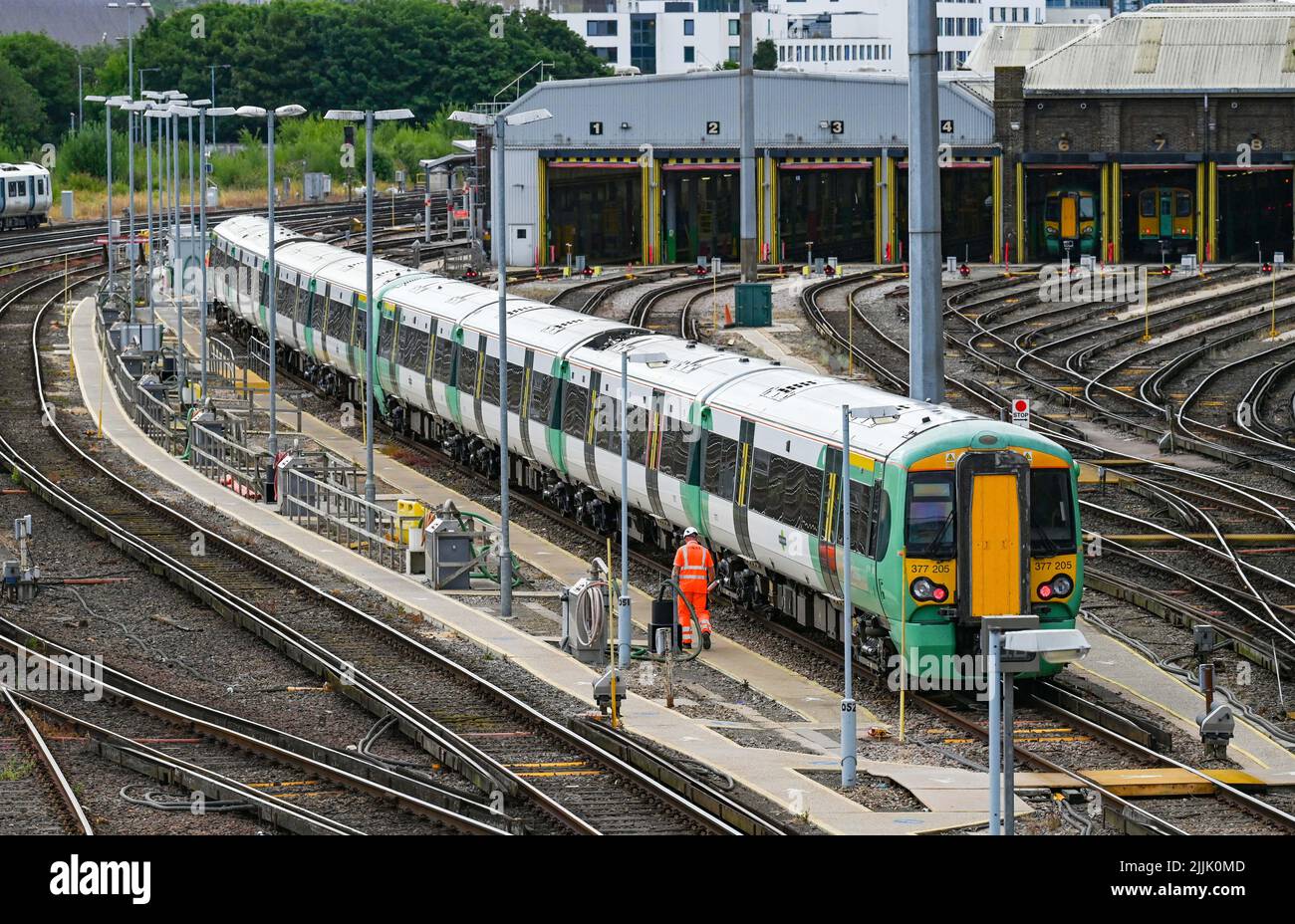 Brighton UK 27th July 2022 - A Southern train stands in the sidings ...