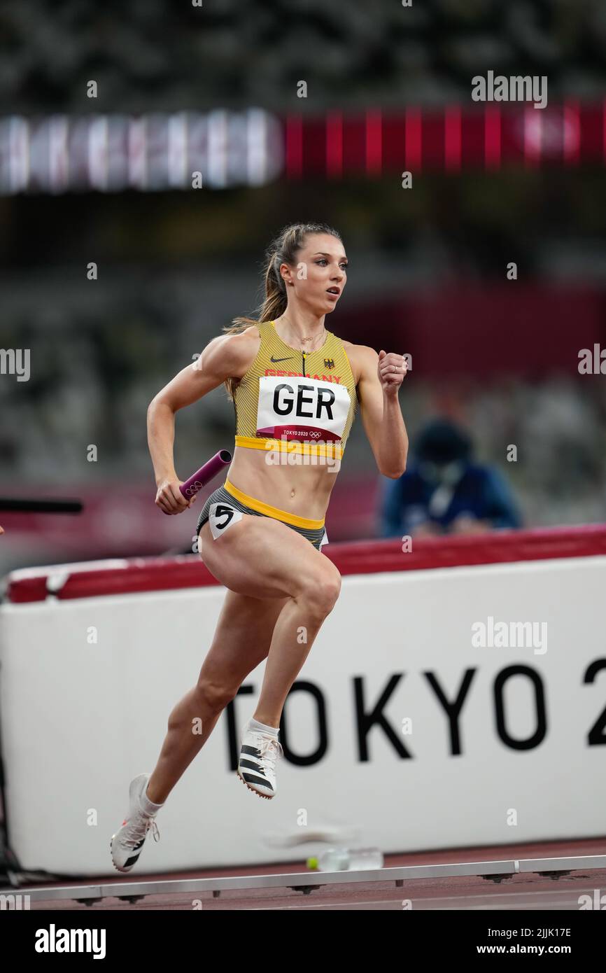 Laura Muller participating in the 4x400 meter relay at the 2020 Tokyo ...