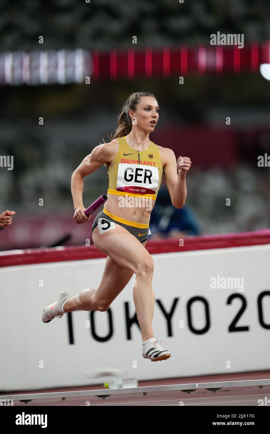 Laura Muller participating in the 4x400 meter relay at the 2020 Tokyo ...