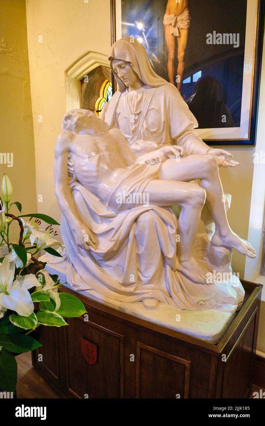 A large reproduction, copy of Michaelangelo's famous Pieta, the ...