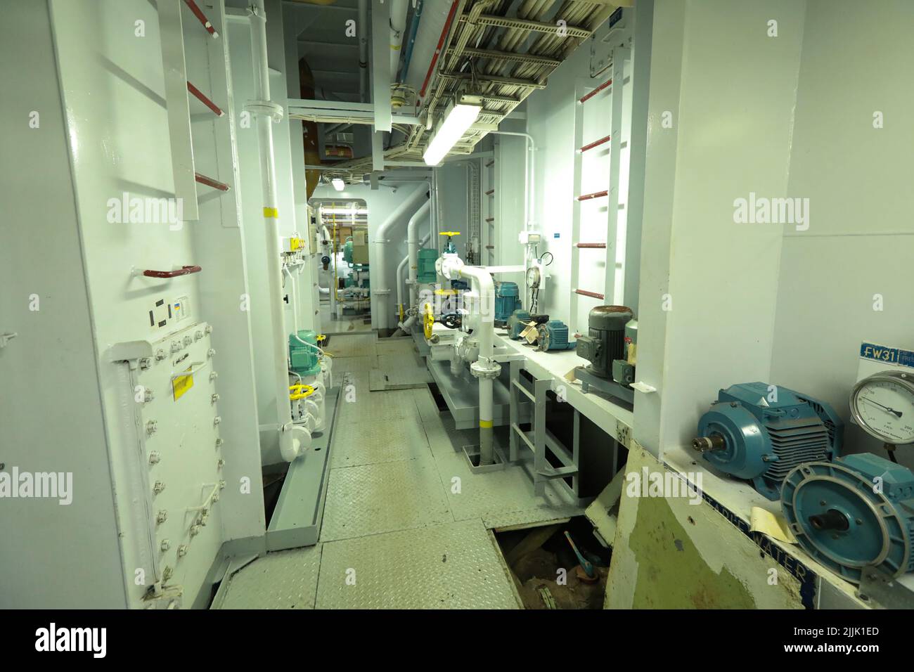 Cruise ship engine room interior with water tight doors electrical and ...