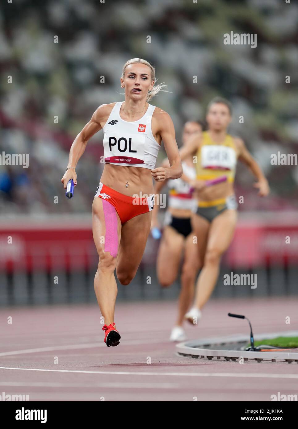 Justyna Swiety-Ersetic participating in the 4x400 meter relay at the ...