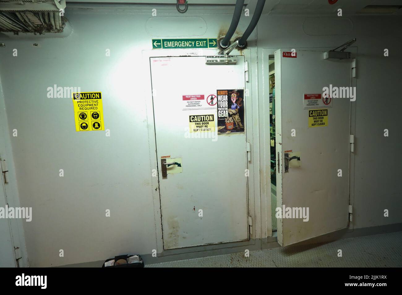 Cruise ship engine room interior with water tight doors electrical and ...