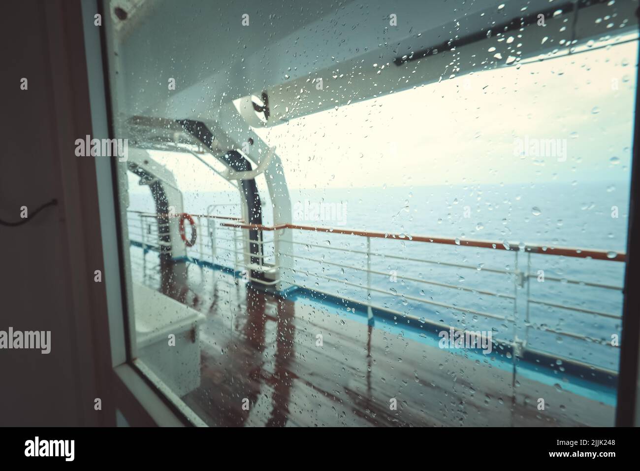 Cruise ship Open deck with Rescue Lifeboats and life buoy through the ...