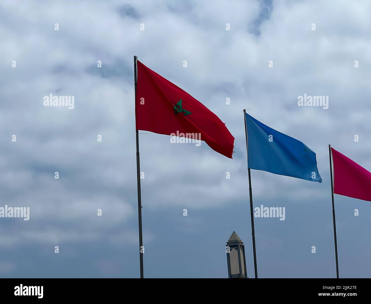 Moroccan flag fluttering blue hi-res stock photography and images - Alamy