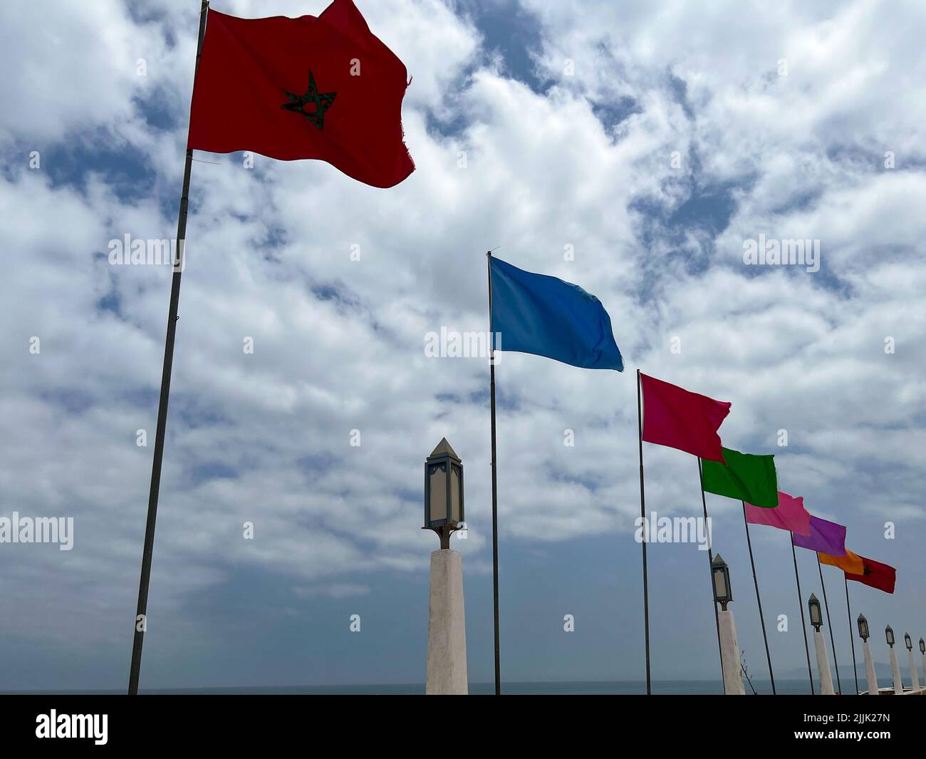 Moroccan flag fluttering blue hi-res stock photography and images - Alamy