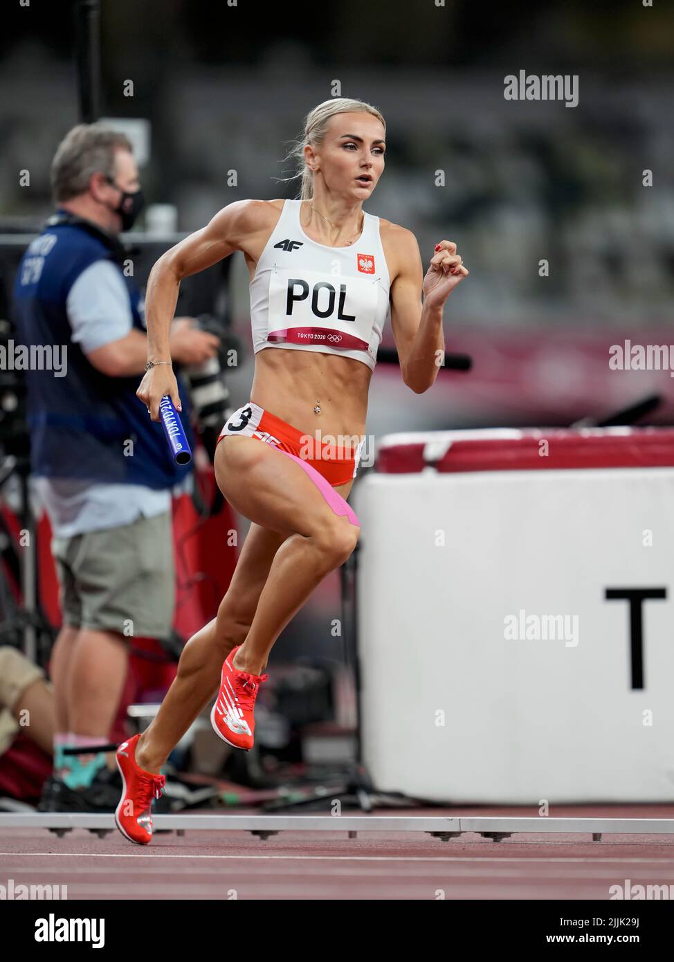 Justyna Swiety-Ersetic participating in the 4x400 meter relay at the ...