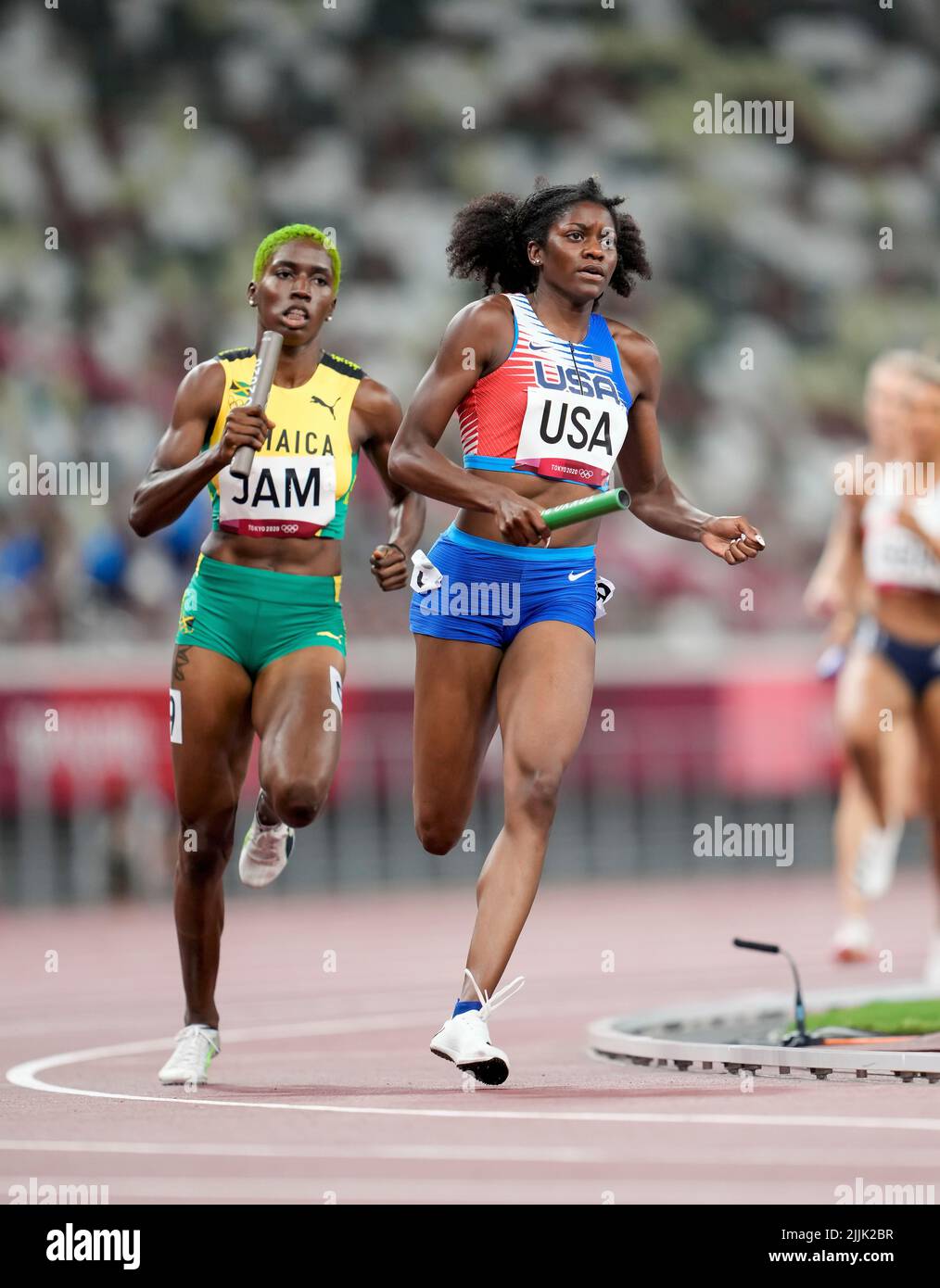 Kendal Ellis participating in the 4x400 meter relay at the 2020 Tokyo ...