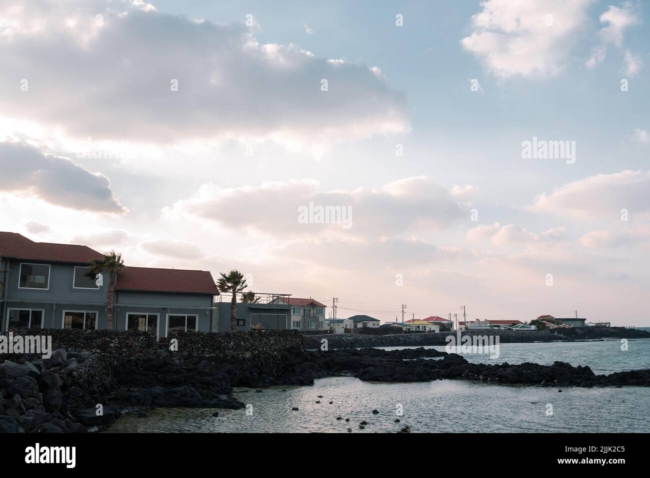 Geumneung Beach and seaside village in Jeju island, Korea Stock Photo ...