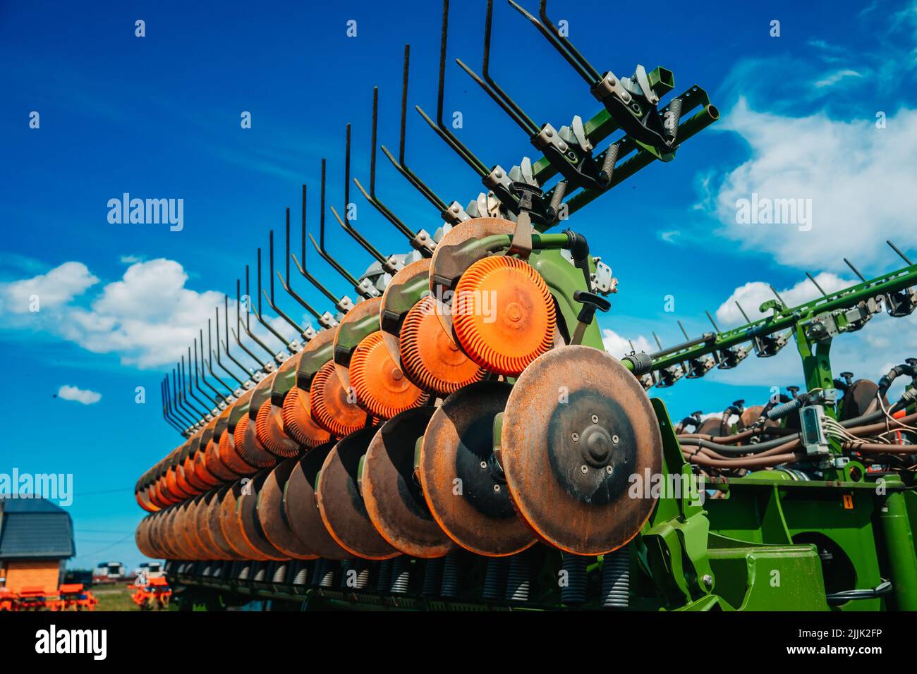 Row seed drill grain. Seed sowing device. Agricultural activity. Close ...
